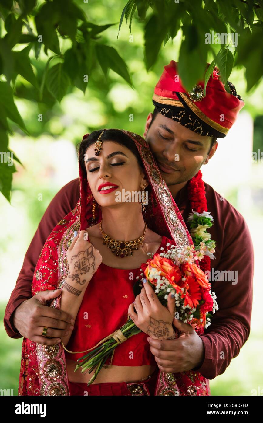 Indian couple in traditional clothing hi-res stock photography and ...