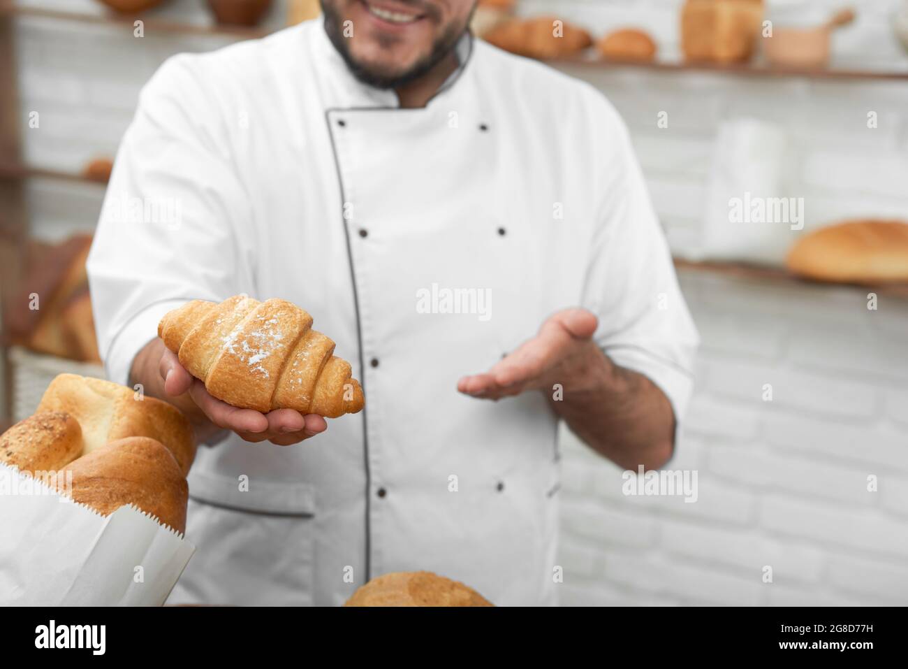 Professional baker at his store Stock Photo - Alamy