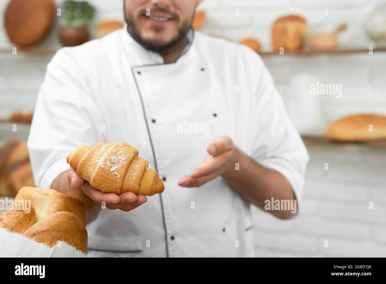 Professional baker at his store Stock Photo - Alamy