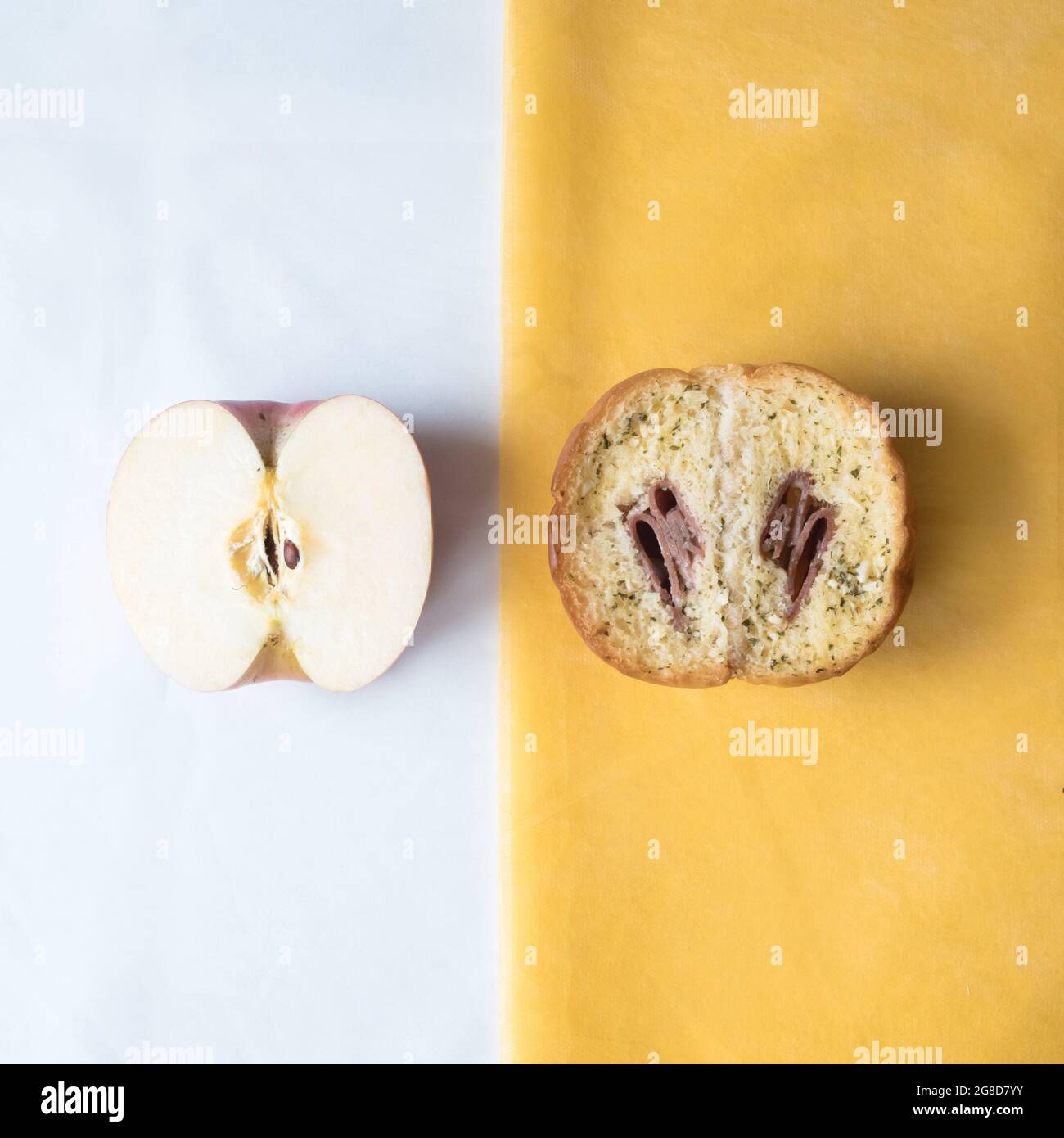 Garlic bread apple shaped in yellow and white background Stock Photo ...