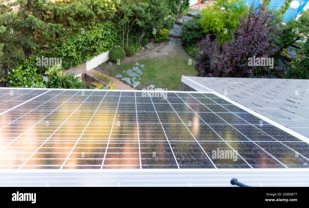 Renewable energy ecologic solar panel on a house Stock Photo - Alamy