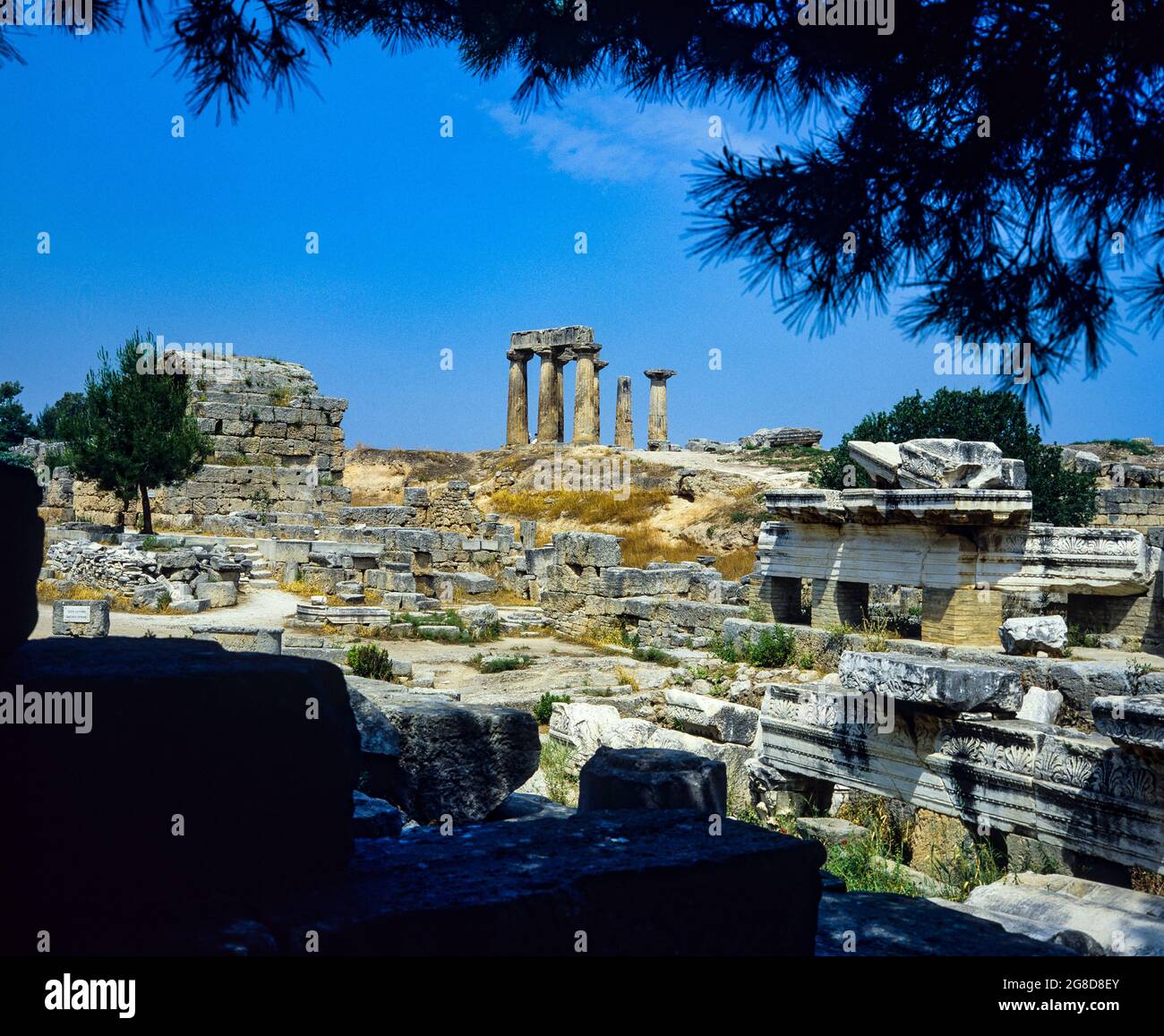 Agora, Roman shops, Temple of Apollo in the distance, Ancient Corinth ...