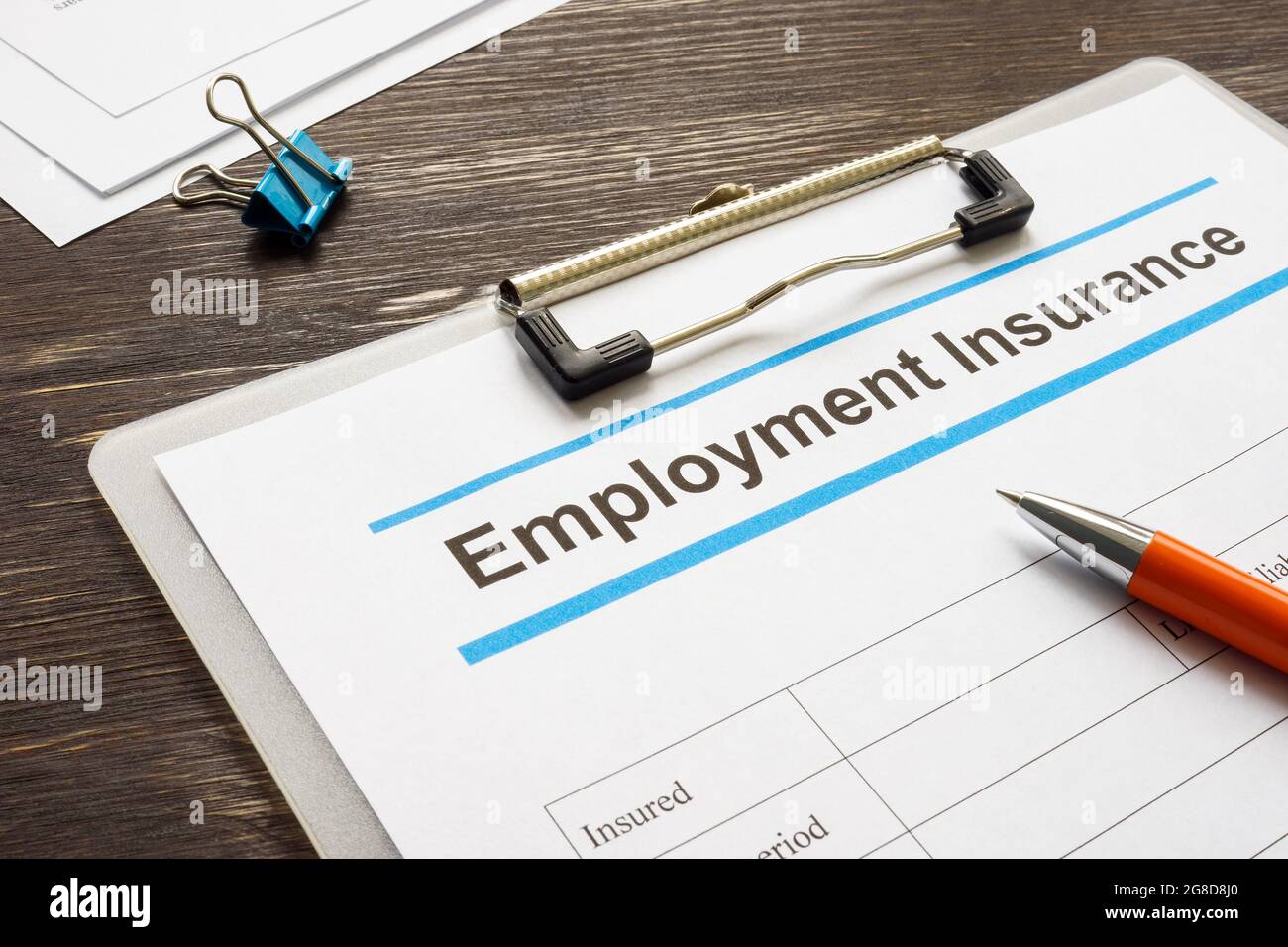 Employment insurance papers for filling in and pen Stock Photo - Alamy