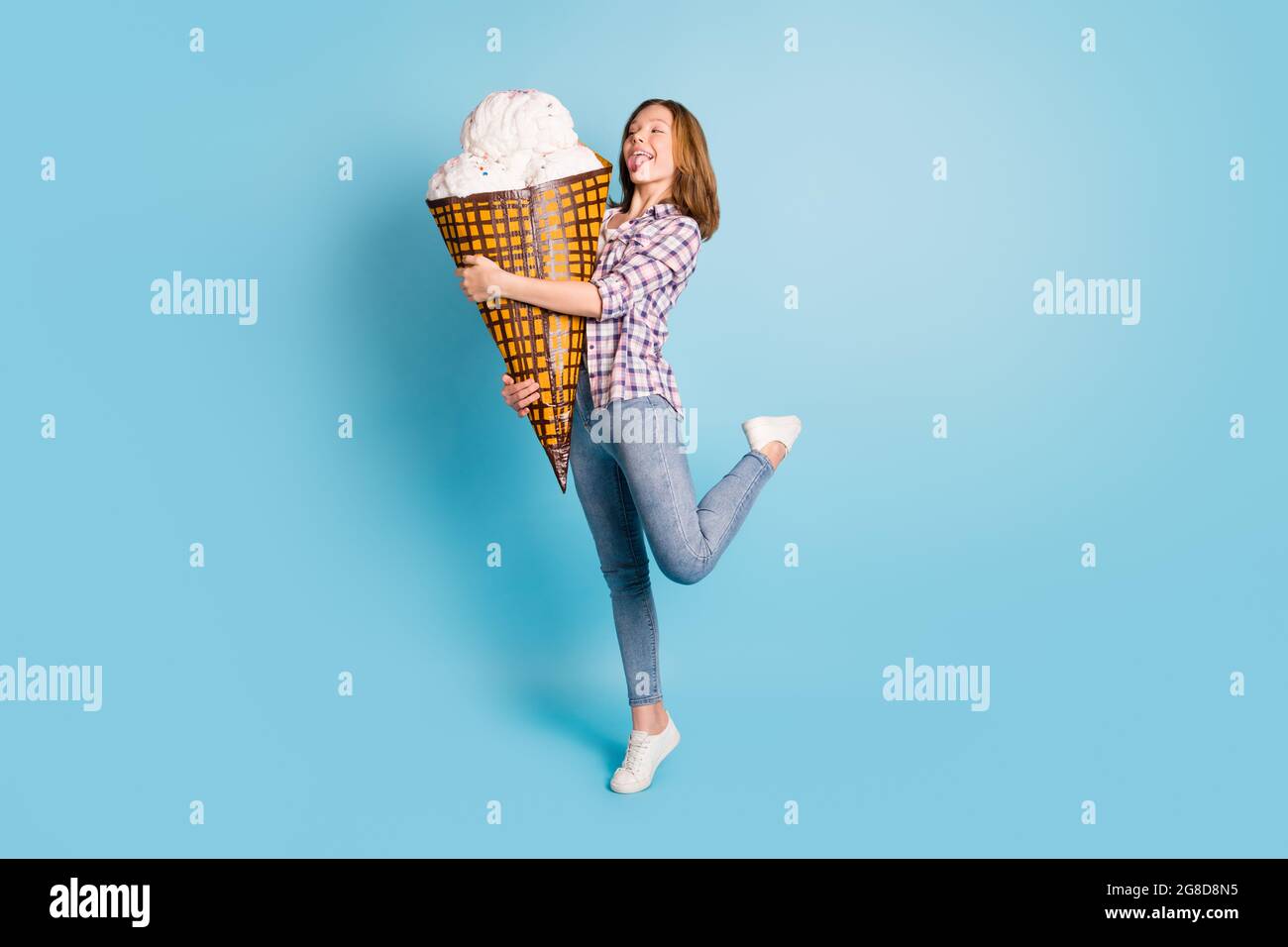 Full size photo of young funky funny girl hug embrace huge ice cream ...