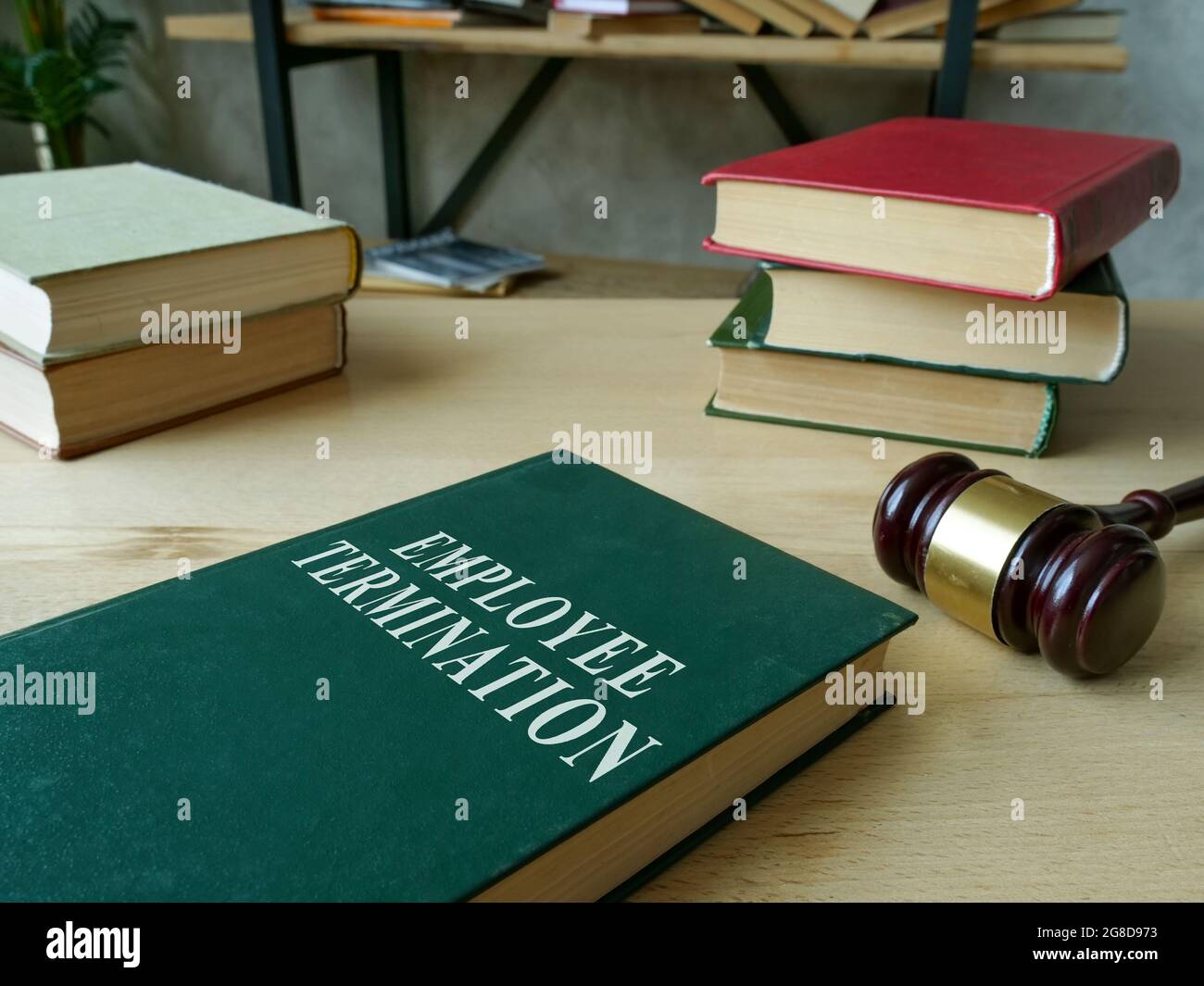 Employee termination rules book and wooden gavel Stock Photo - Alamy