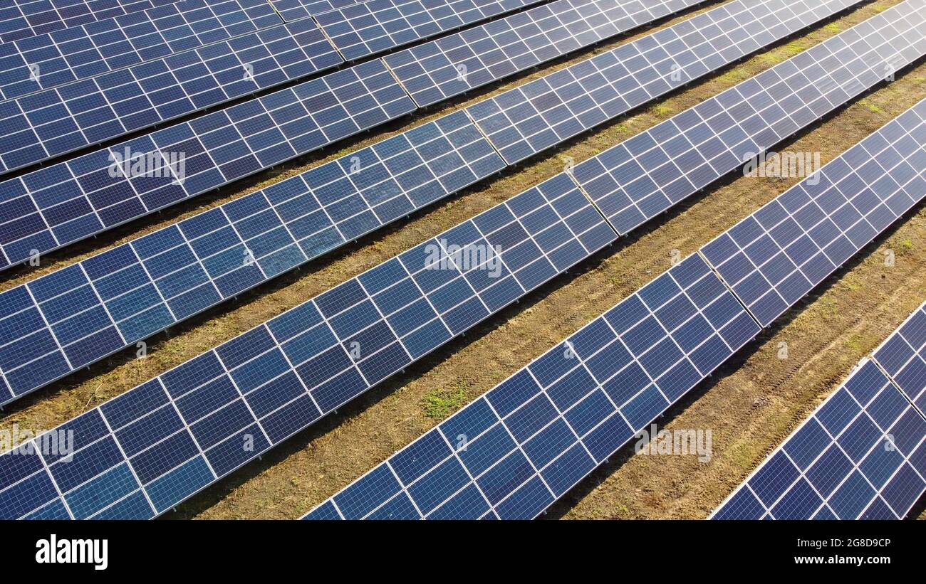 Drone flight over solar panels hi-res stock photography and images - Alamy