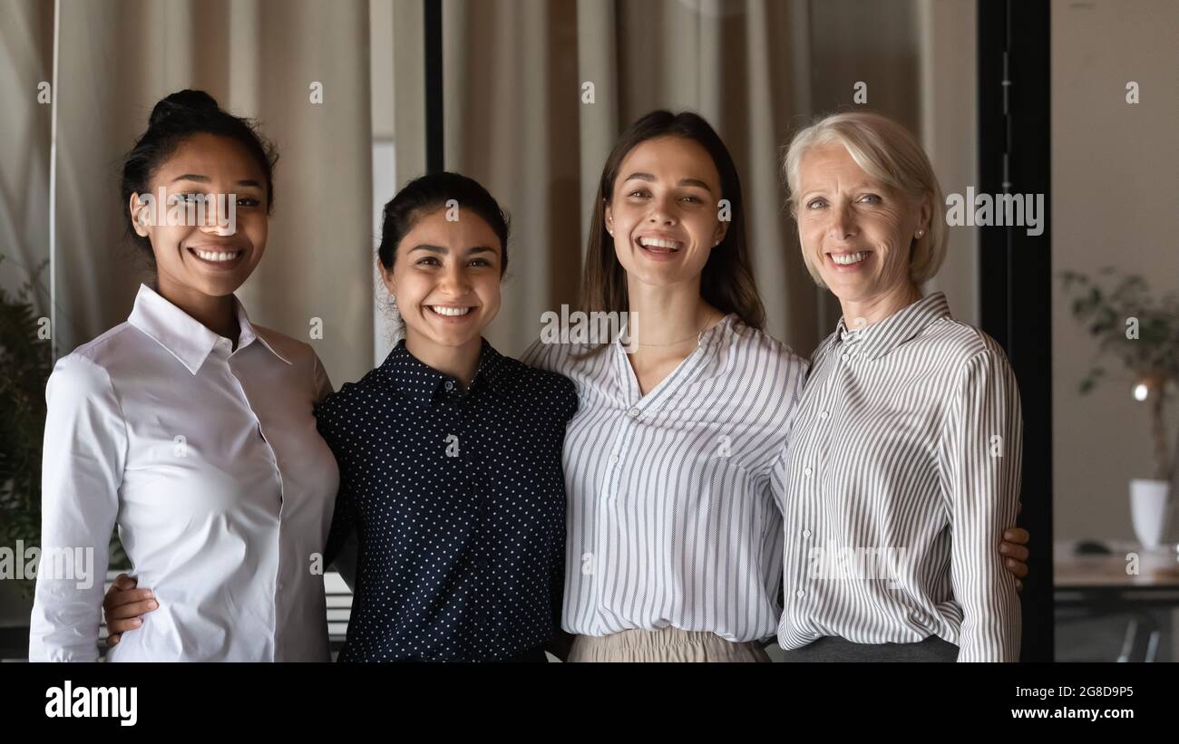 Diverse team of female business leaders standing together Stock Photo ...