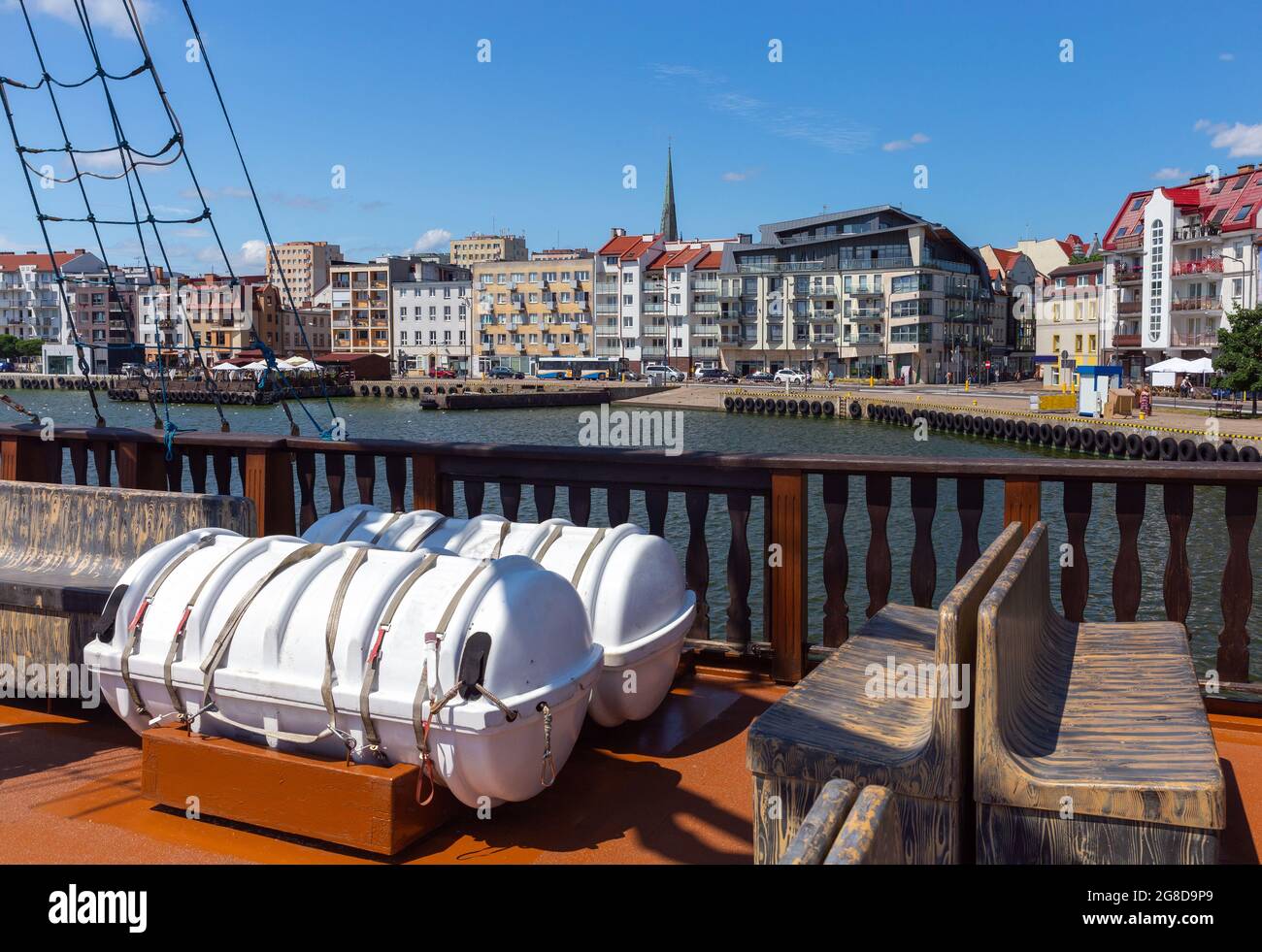 The bay and houses on the city embankment on a sunny day. Swinoujscie ...
