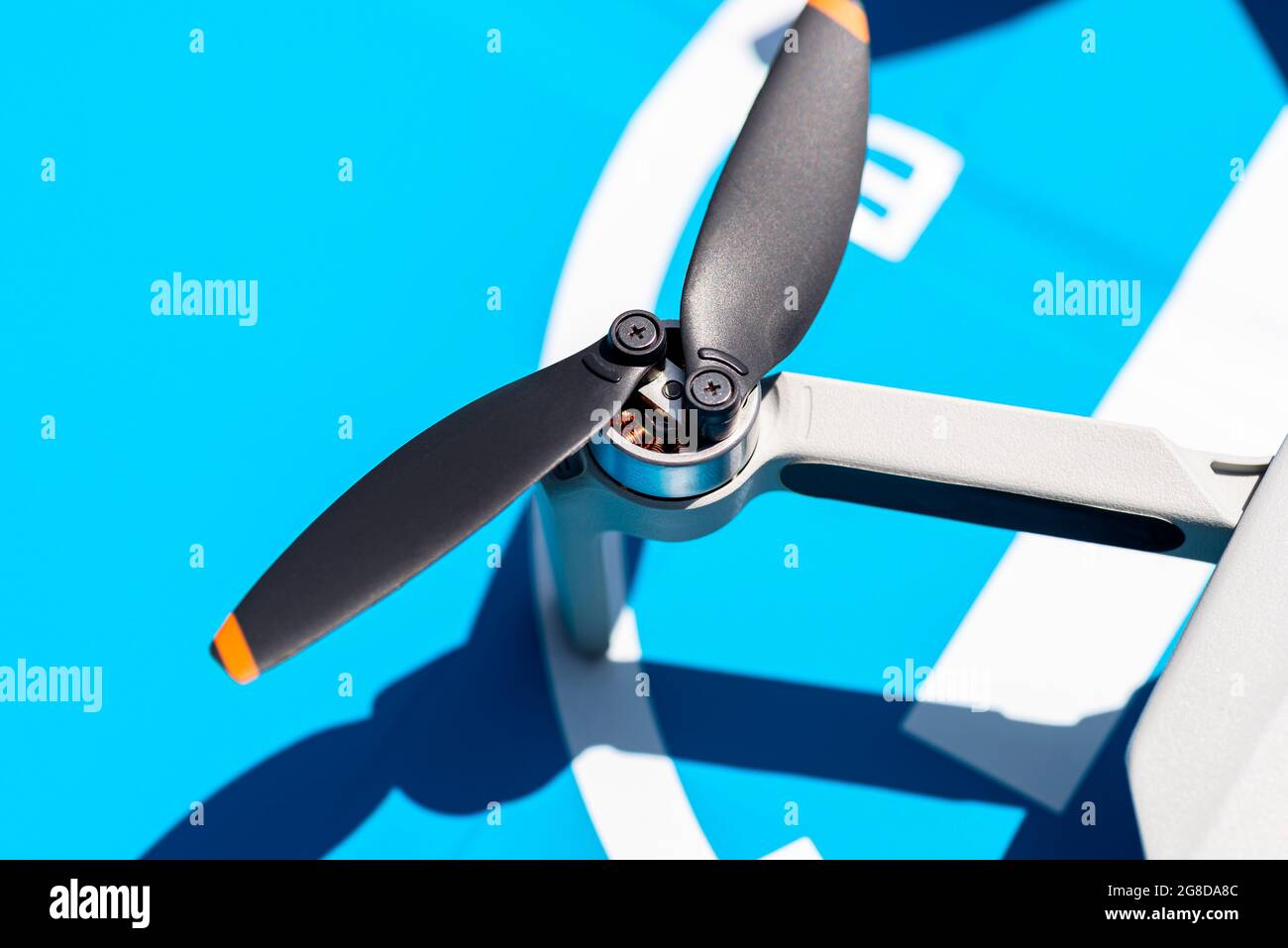 A close-up shot of the complex propellers and brushless motor of a ...