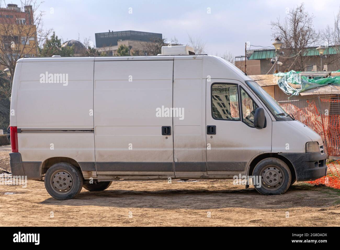 Old White Van for Builders at Construction Site Stock Photo - Alamy