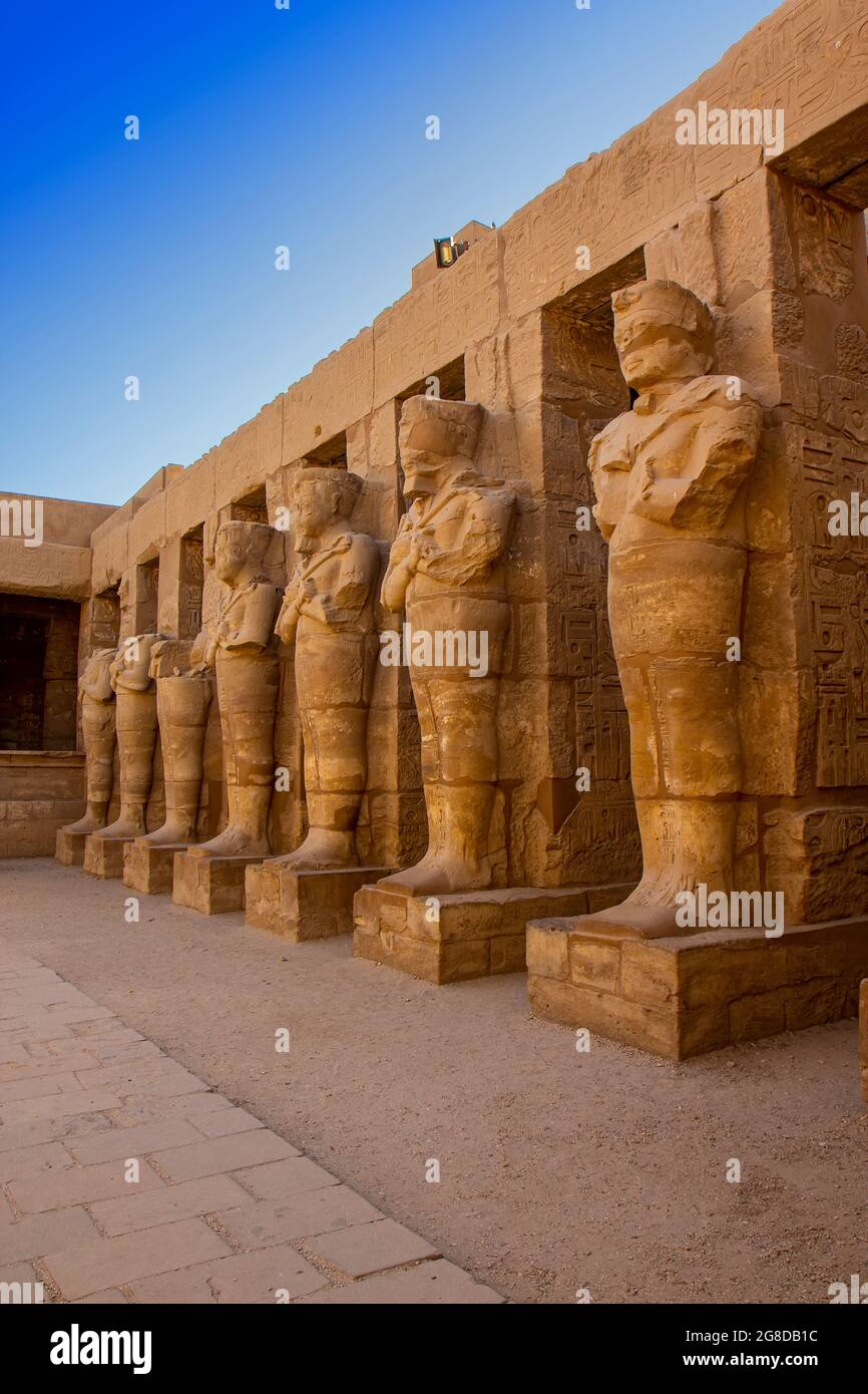 The pillars of Osiris that make up the portico in the courtyard of the ...