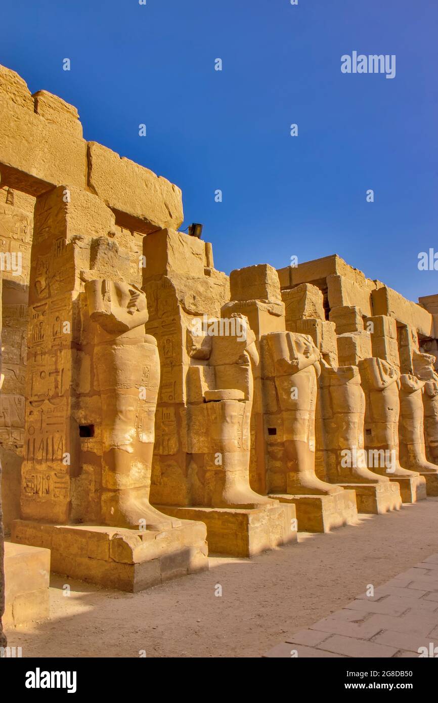 The pillars of Osiris that make up the portico in the courtyard of the ...