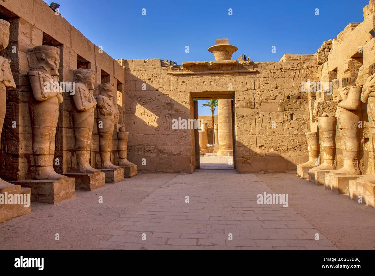 The pillars of Osiris that make up the portico in the courtyard of the ...