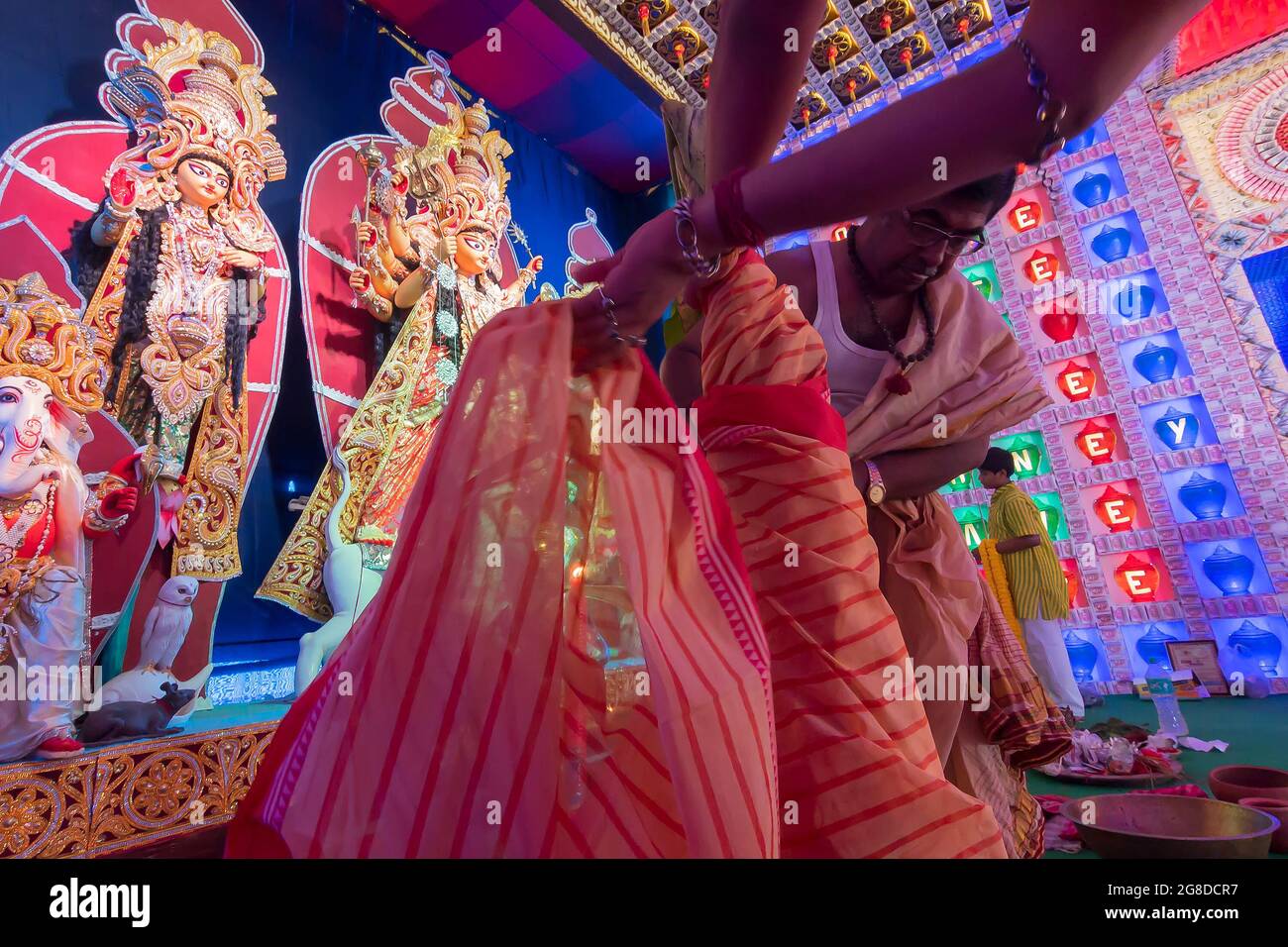 Howrah,West Bengal,India - 5th October 2019 : Hindu priests draping red ...