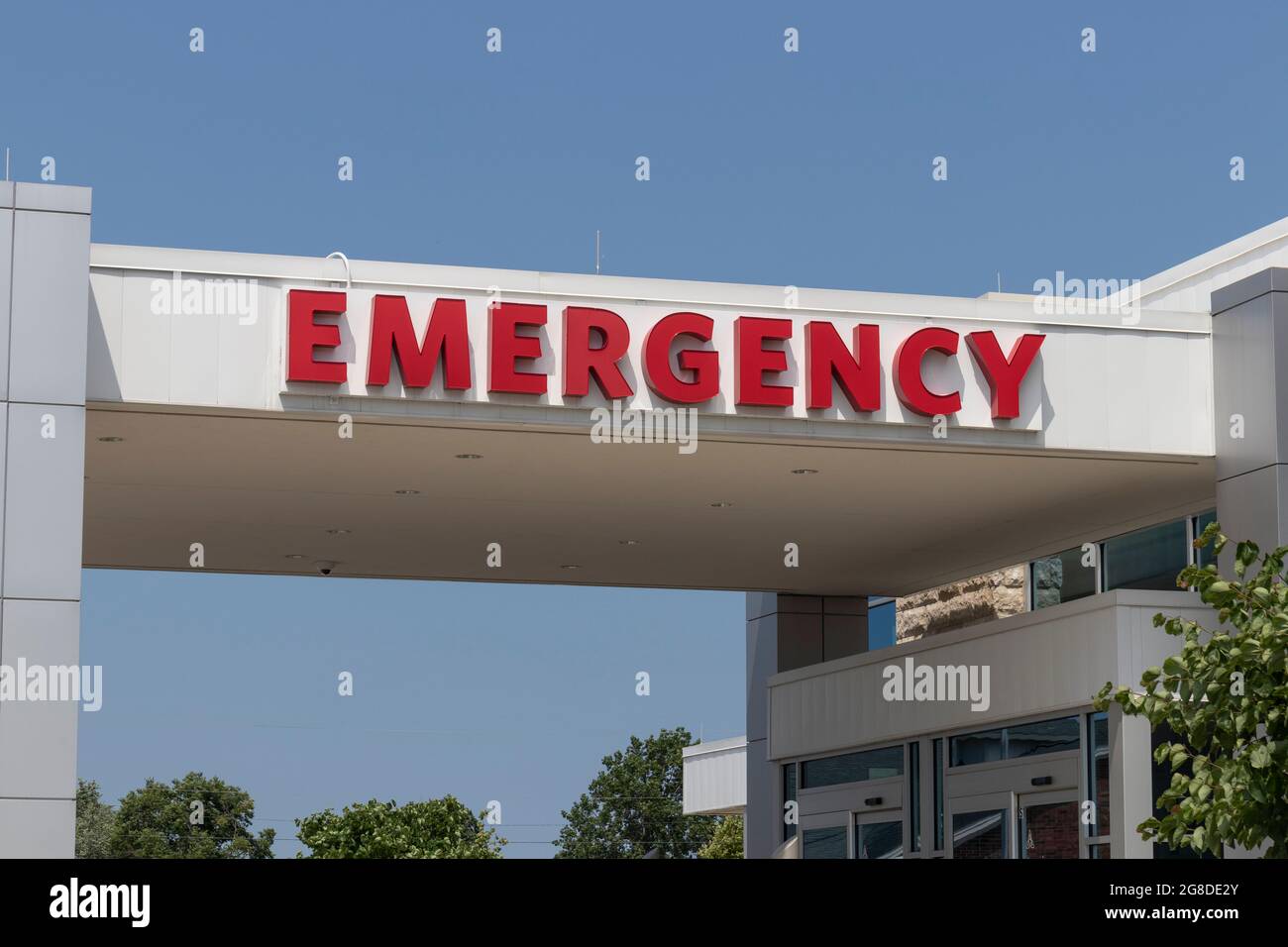 Red Emergency Entrance Sign for a Local Hospital Stock Photo - Alamy