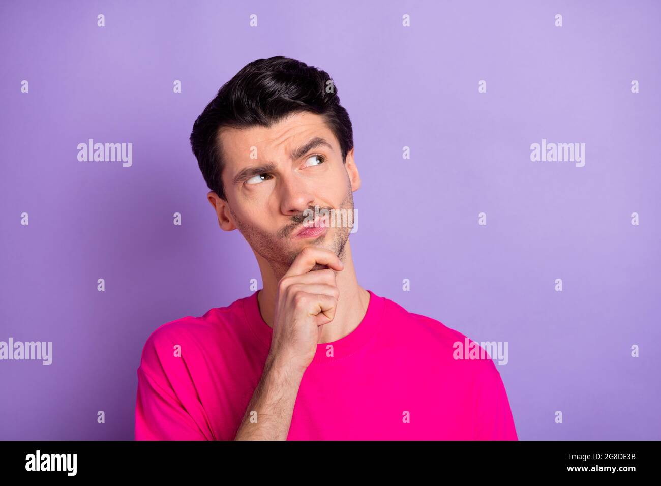Photo of young serious thoughtful minded man thinking hold hand chin ...