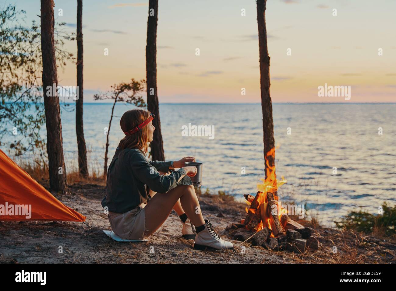 Tourist near fire in woods hi-res stock photography and images - Alamy