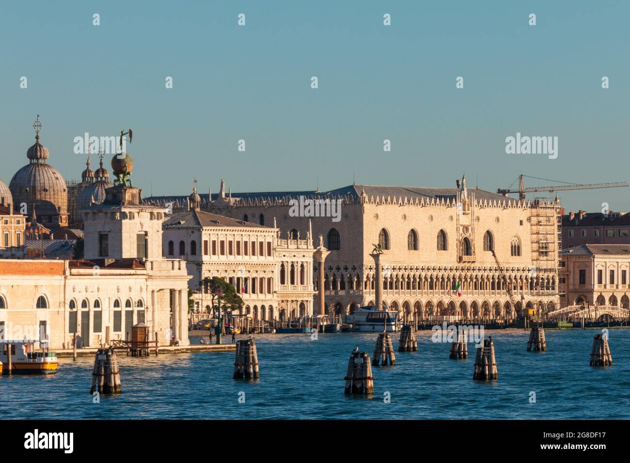 Scenic view of architectural buildings and a port in Venice, Italy ...