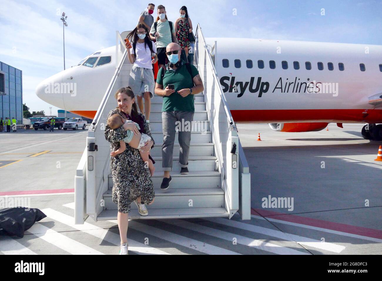 Non Exclusive: ODESA, UKRAINE - JULY 16, 2021 - Passengers alight from ...