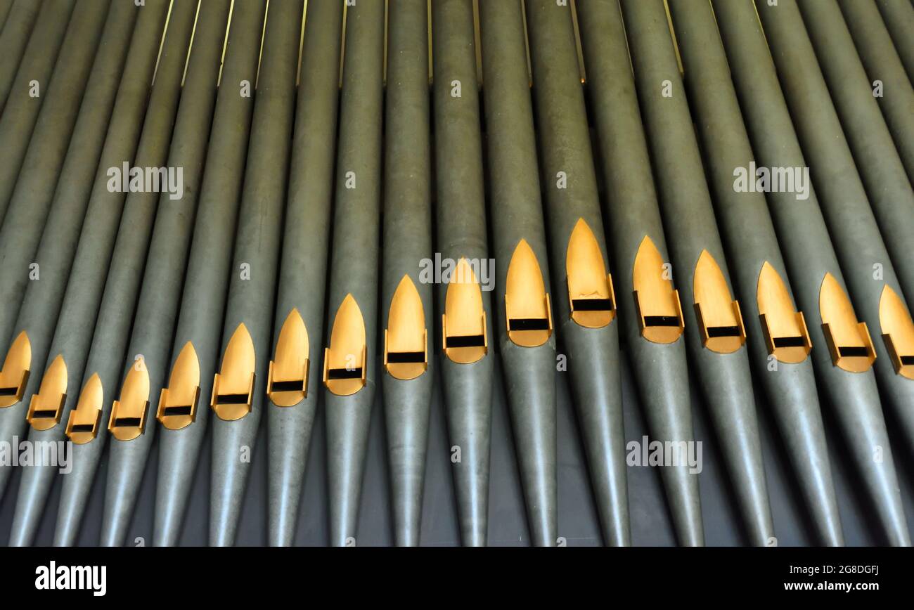 Organ Pipes background metal silver and gold finish Stock Photo - Alamy