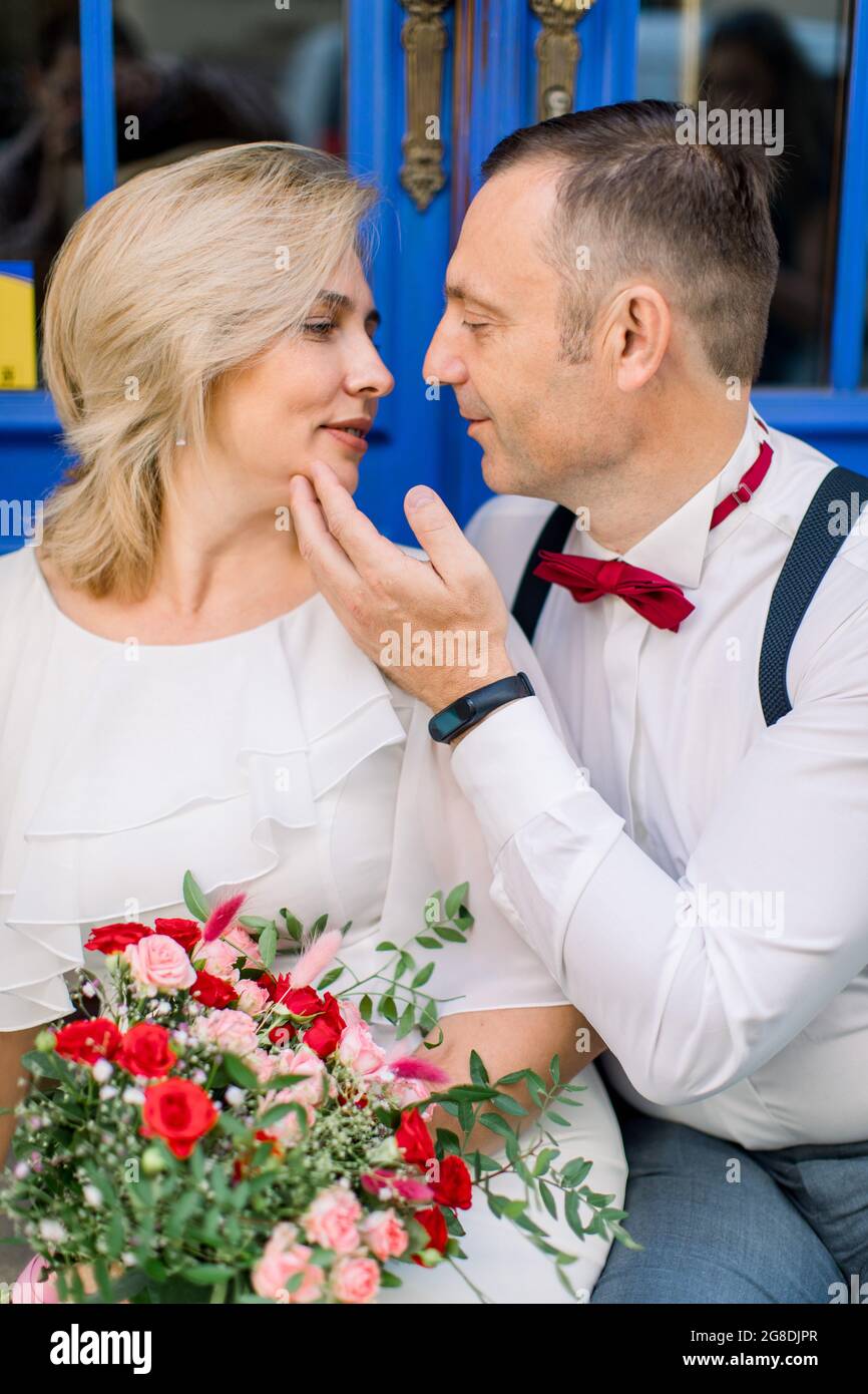 Warmth in relationship. Affectionate mature couple in love embrace ...