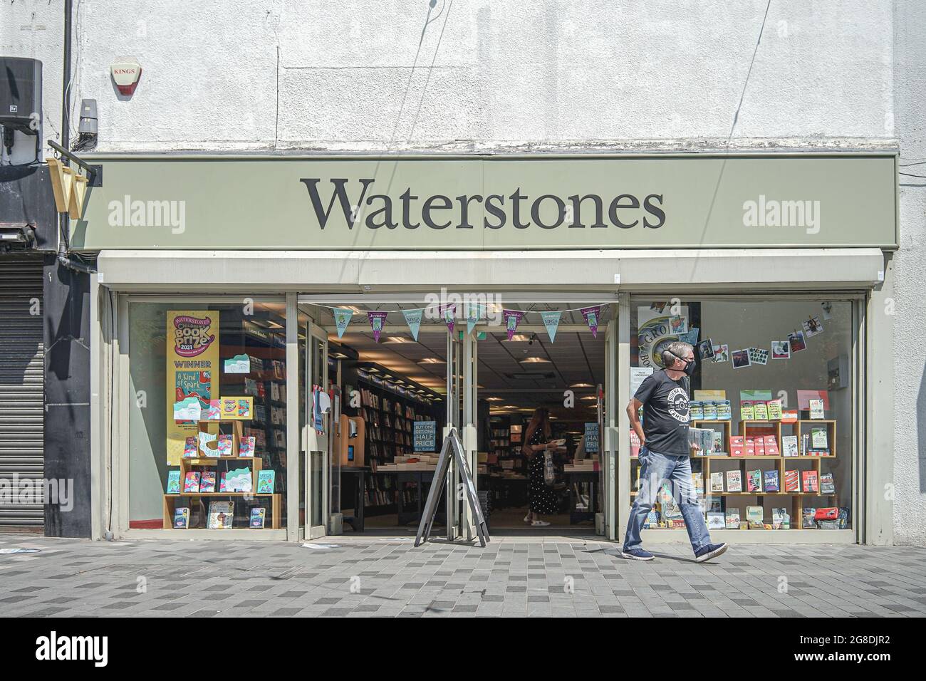 Customer leaves Waterstones Book Store. Bow Street. (Photo by Michael ...