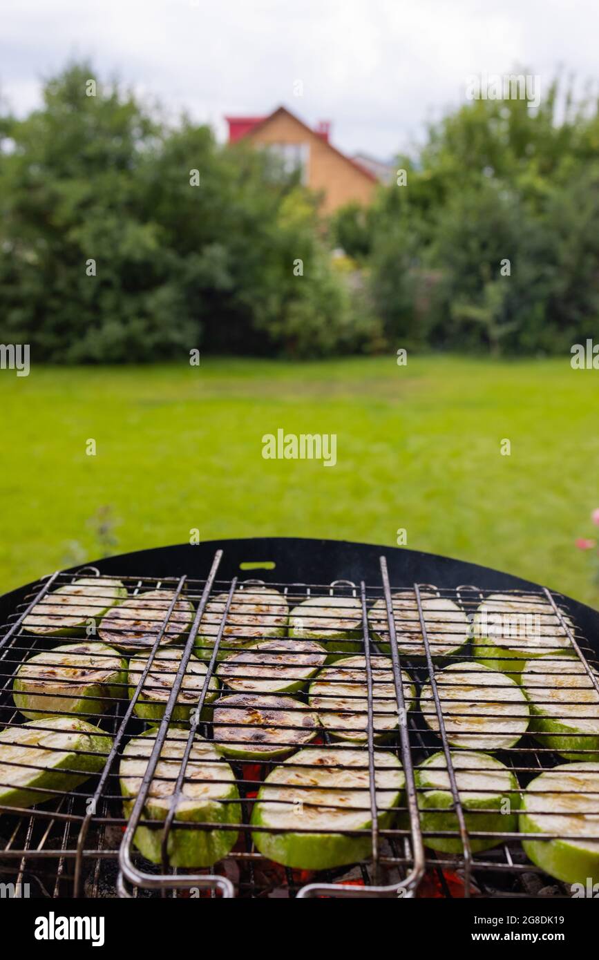 Grilled vegetables are baked to prepare an Oriental dish. Peppers ...