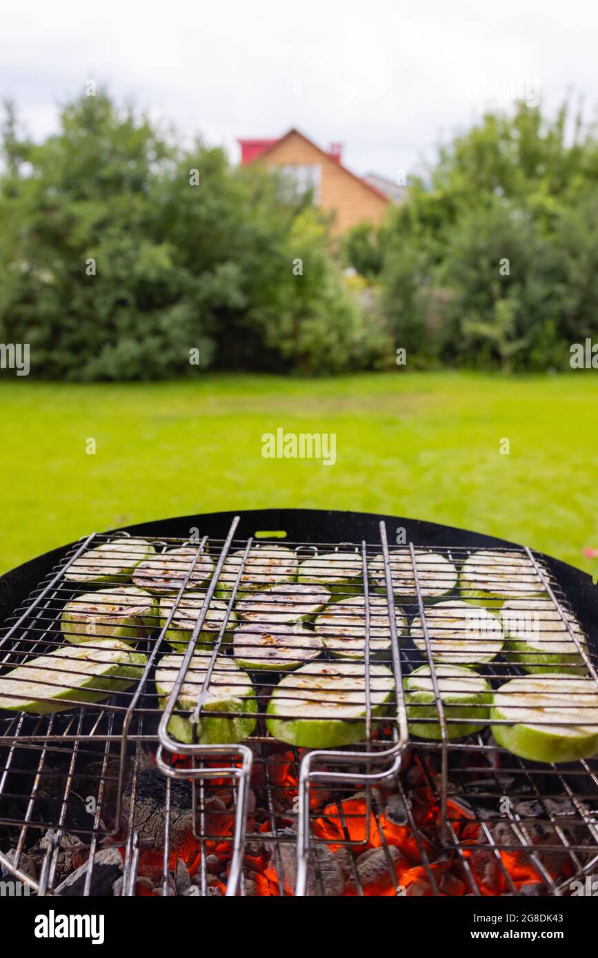 Grilled vegetables are baked to prepare an Oriental dish. Peppers ...