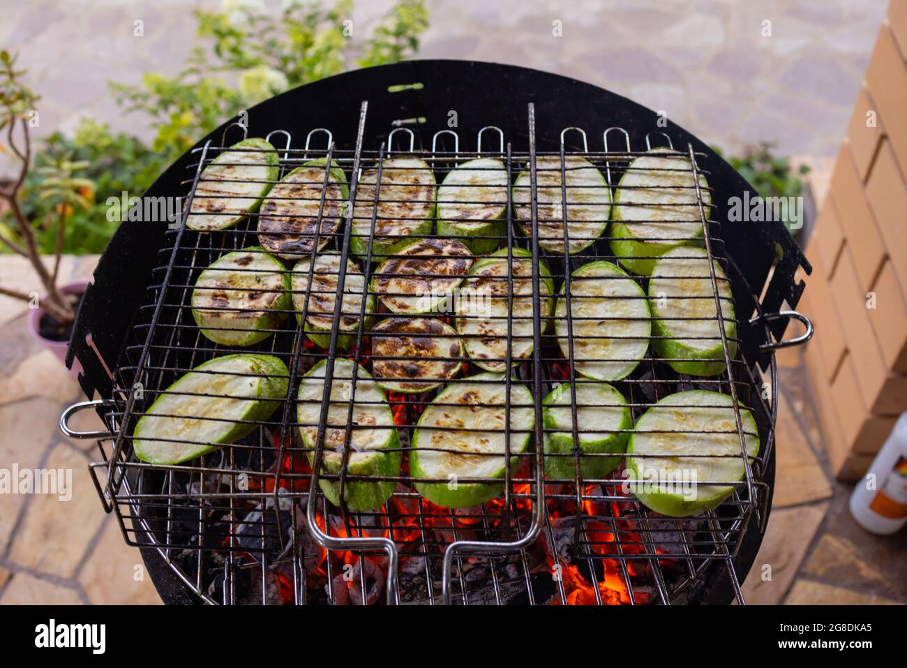 Grilled vegetables are baked to prepare an Oriental dish. Peppers ...