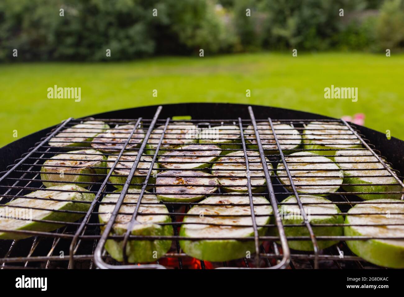 Grilled vegetables are baked to prepare an Oriental dish. Peppers ...