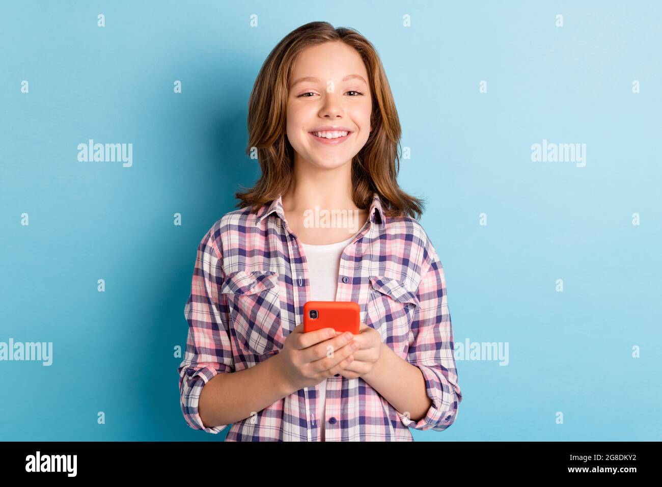 Photo of nice optimistic red hairdo girl write telephone wear plaid ...