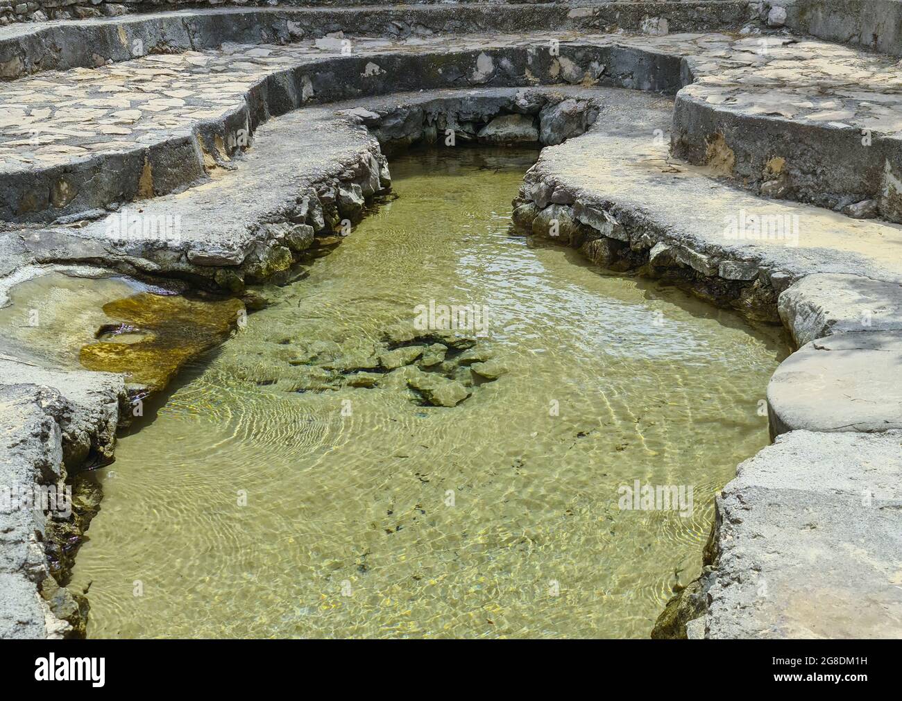 Artificial puddle on the park Stock Photo - Alamy
