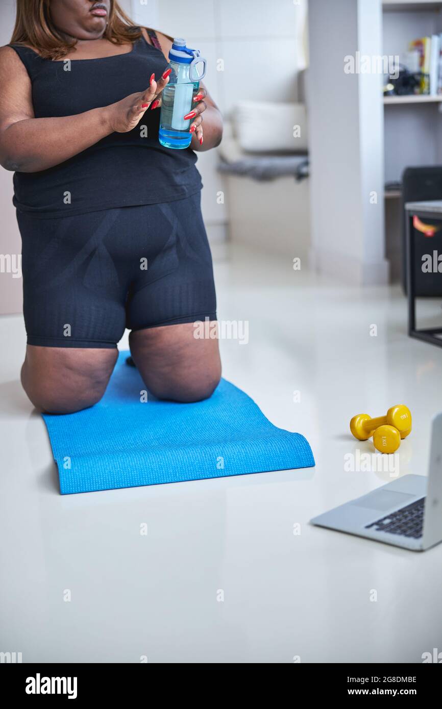 Mindful young african woman hi-res stock photography and images - Alamy