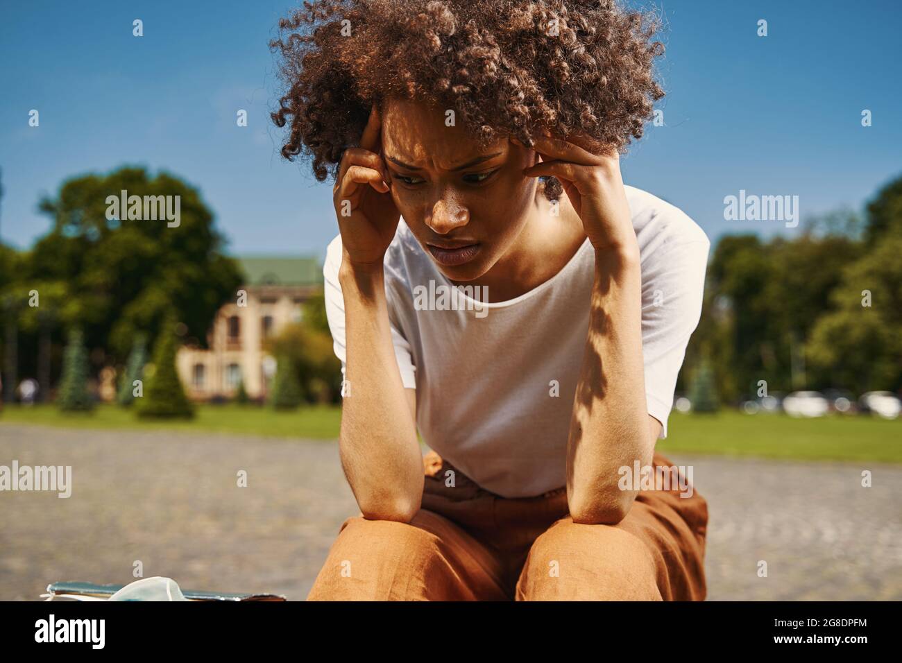 Worried young woman thinking about difficult situation Stock Photo - Alamy
