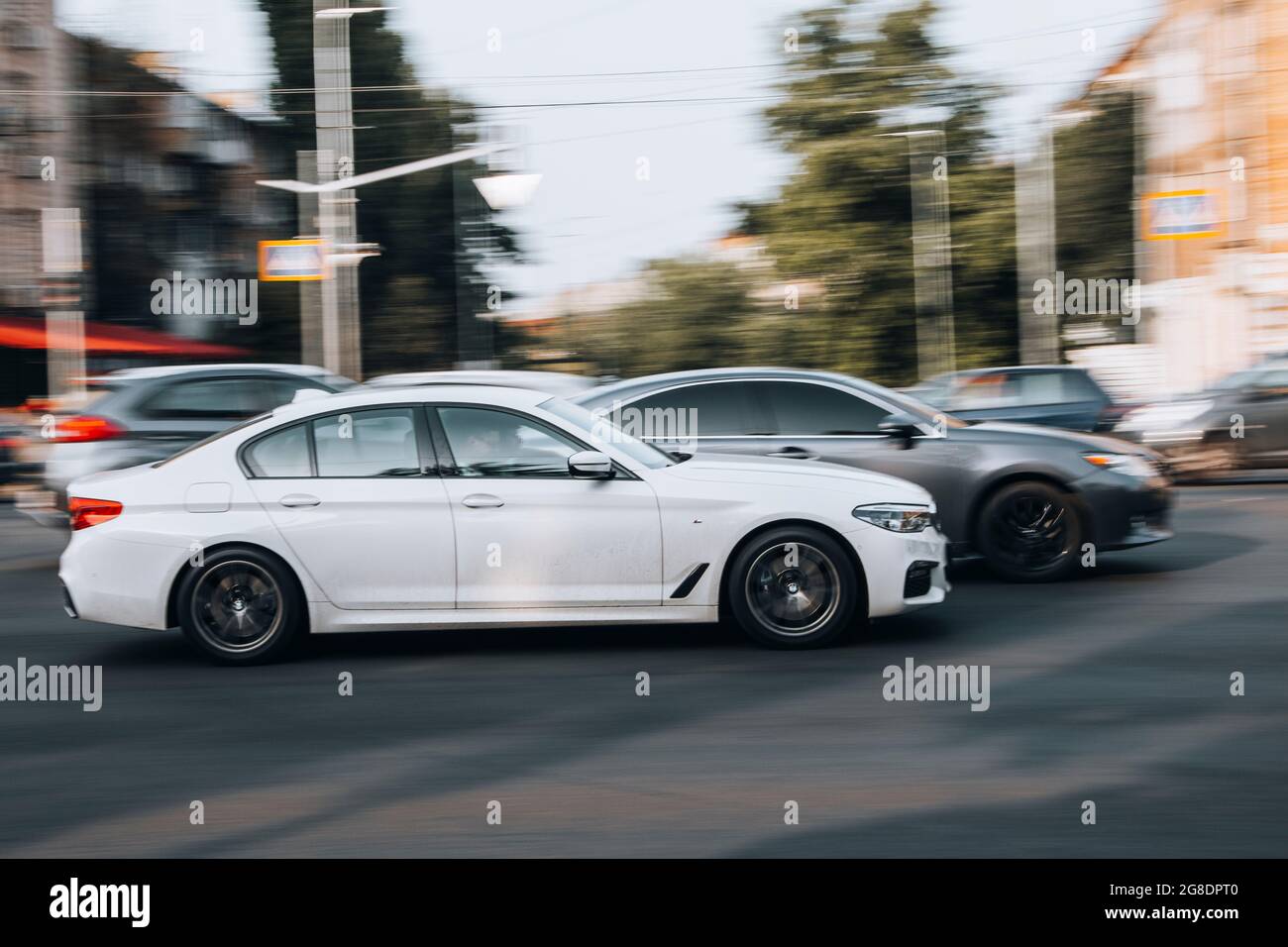 Ukraine, Kyiv - 16 July 2021: White BMW M5 car moving on the street. Editorial Stock Photo - Alamy