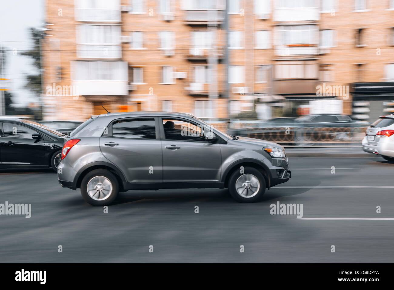 Ukraine, Kyiv - 16 July 2021: Gray SsangYong Actyon car moving on the ...