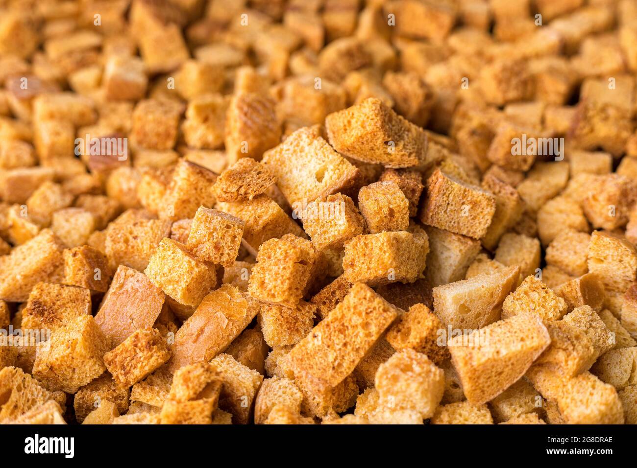 Square-shaped bread crumbs. Oven-fried golden brown bread crumbs ...