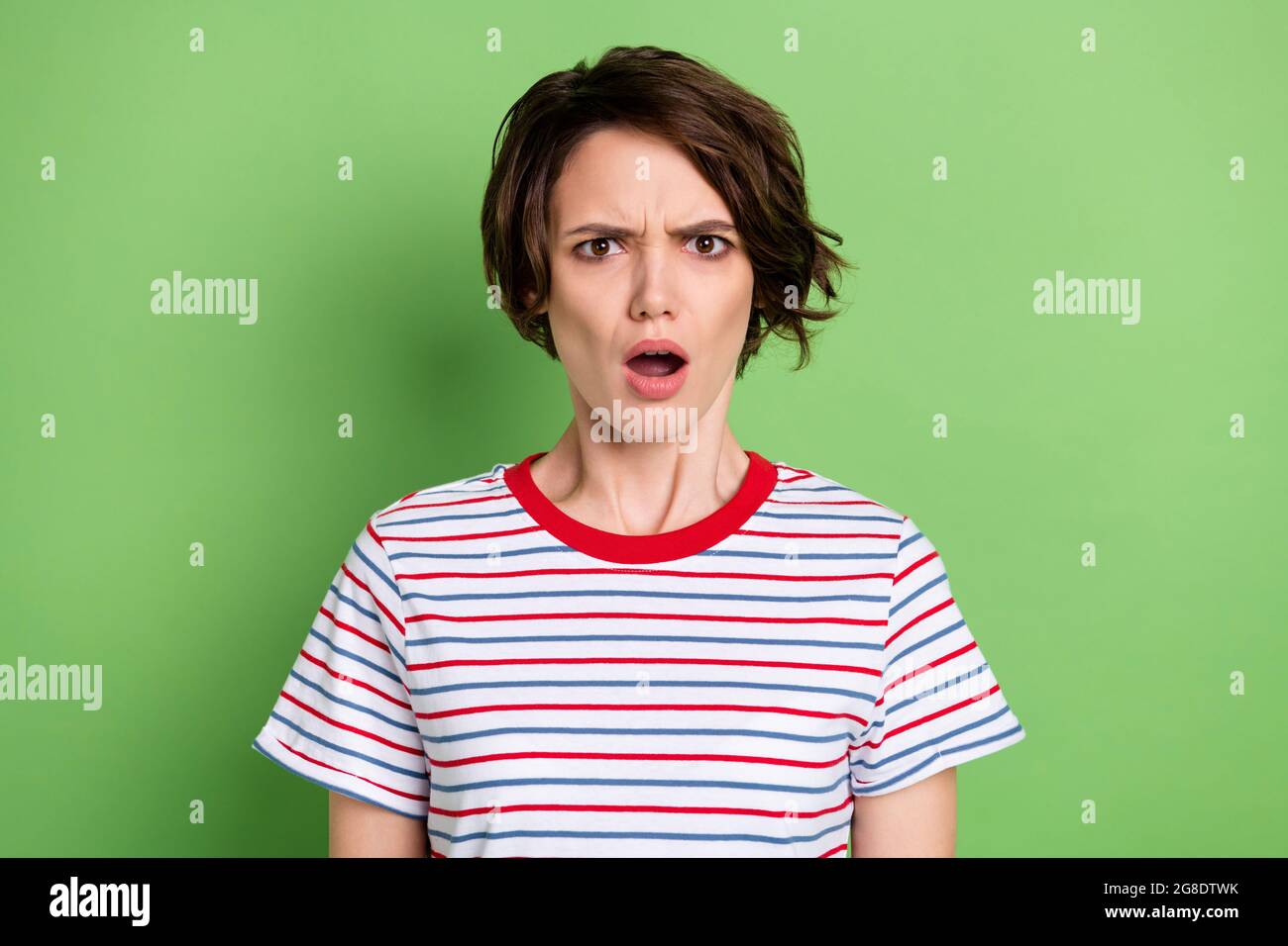 Portrait of pretty worried mad girl misunderstanding isolated over ...