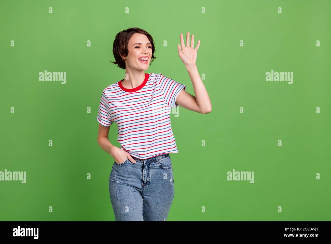 Portrait of pretty cheerful glad girl walking waving hi hello isolated ...