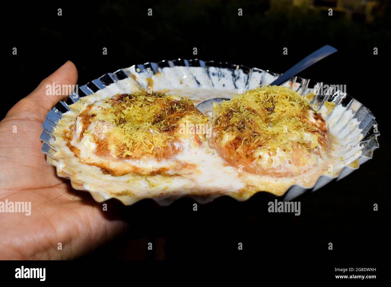 Top view of Dahi wada or dahi bhalla made from yogurt or curd spread ...