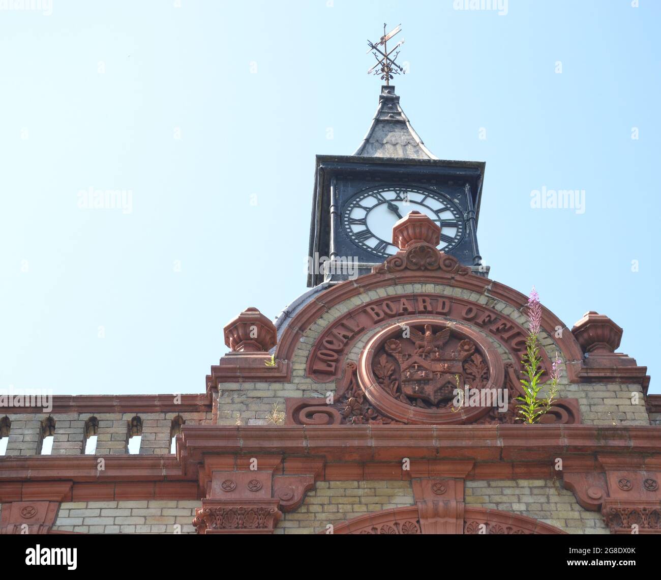 Detail of clock and top of building of former Withington Town Hall ...