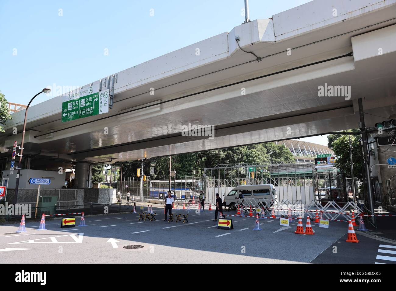 Private security company guards watch over a closed road in front of ...