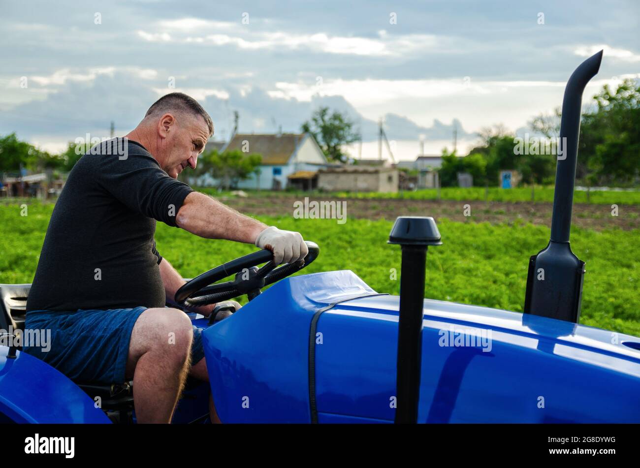 The driver is driving a tractor. Driving agricultural machinery ...