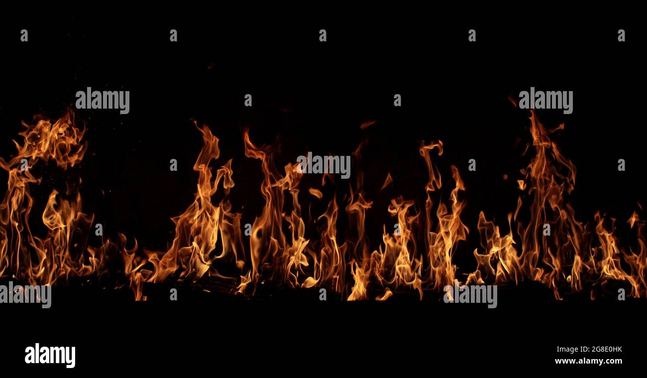 fire line on black. Shining flame on dark background. A lot of space ...