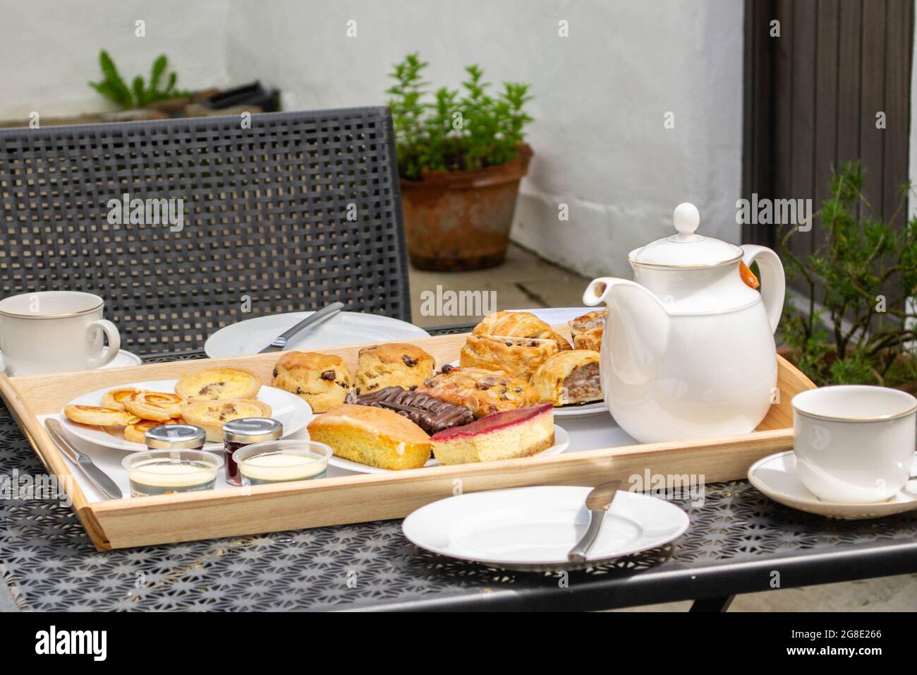 Afternoon tea selection in Devon, England, including scones and tea ...