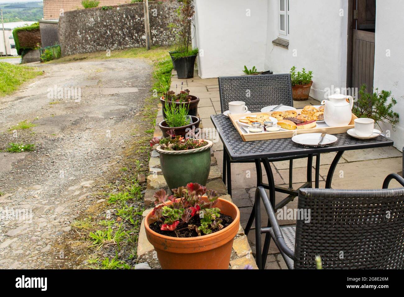 DEVON, ENGLAND- 25 June 2021: Afternoon tea selection in Devon, England ...