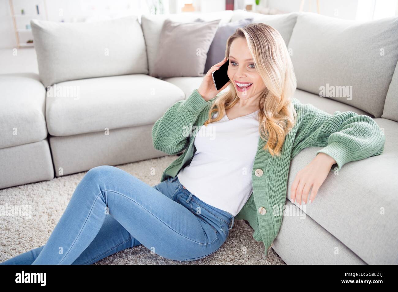 Profile side photo of young woman happy positive smile sit floor ...