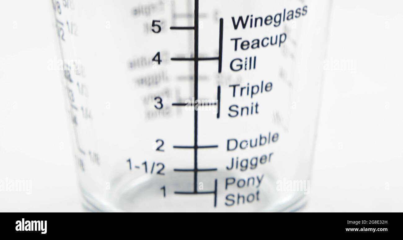 Closeup shot of a graduated measuring cup isolated on a white ...