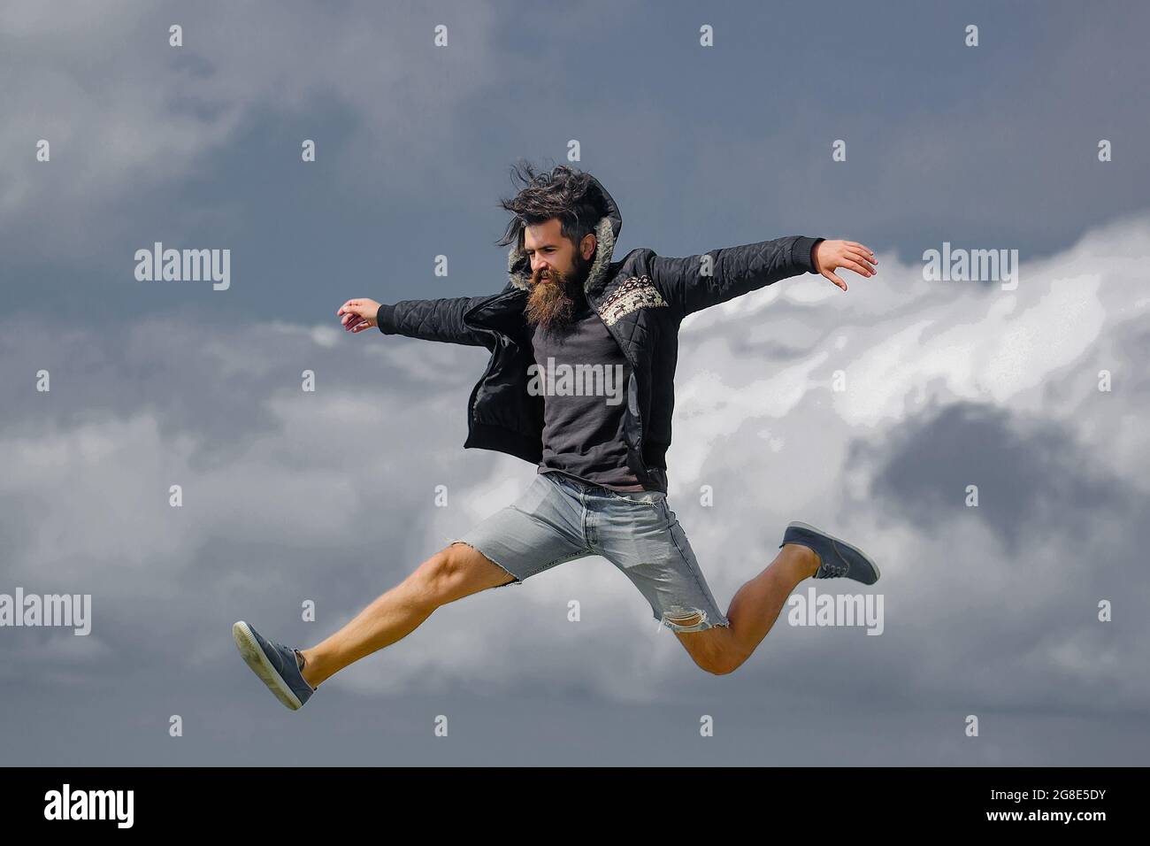 Man hipster jumps Stock Photo - Alamy