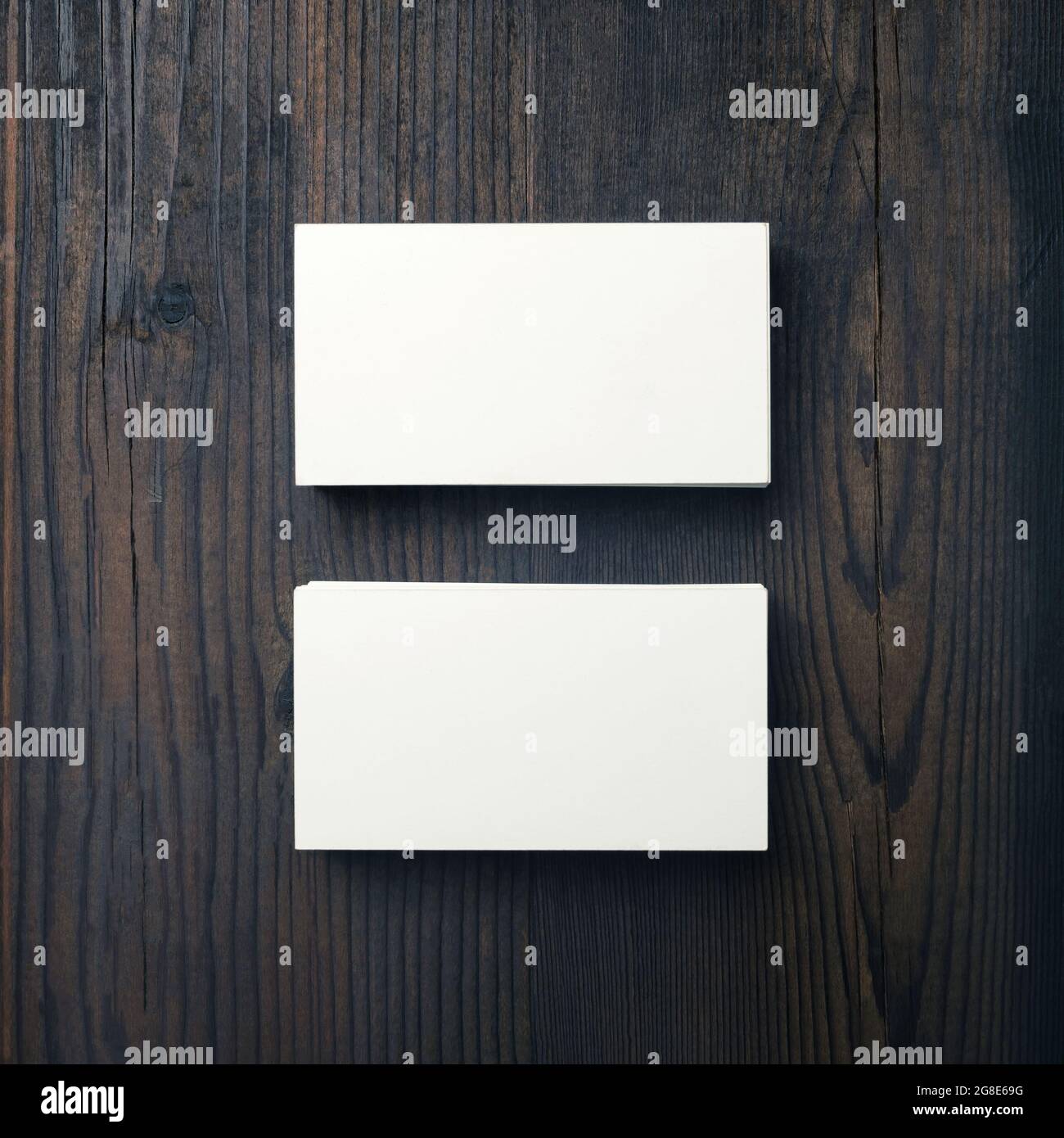 Mockup of blank business cards on wood table background. Top view. Flat ...